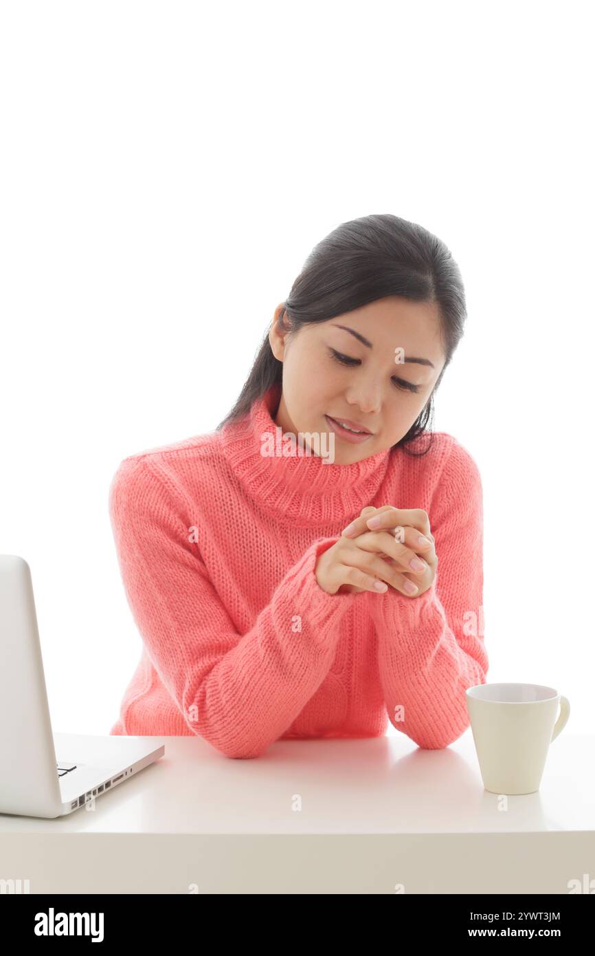 Woman staring at rough hand Stock Photo - Alamy