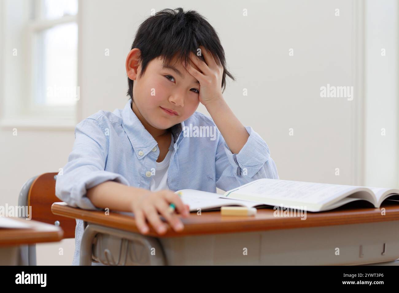 Primary school student who gets sick during class Stock Photo - Alamy