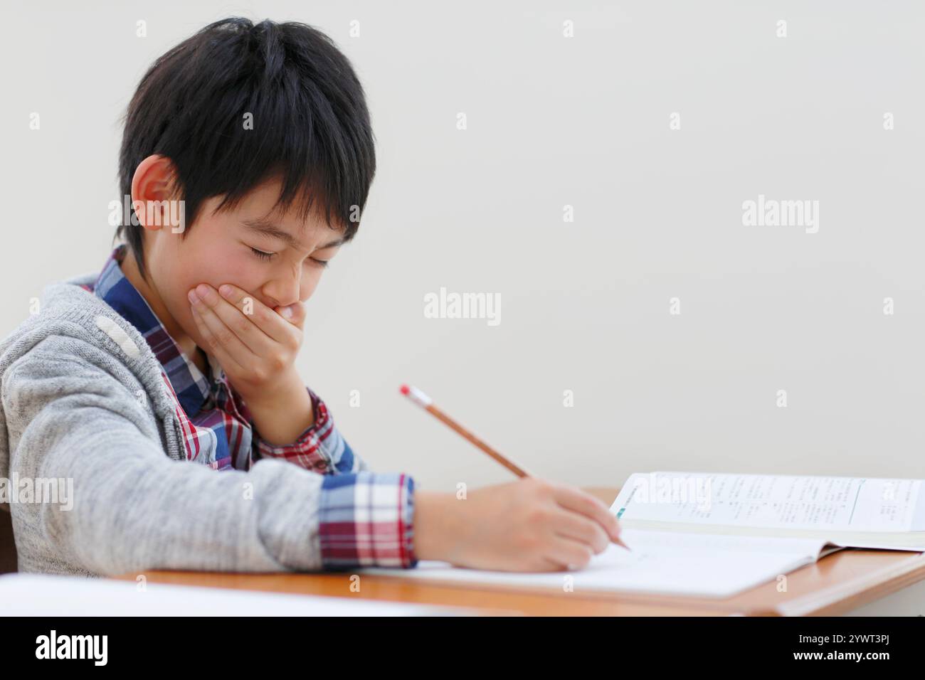 Primary school student who gets sick during class Stock Photo - Alamy