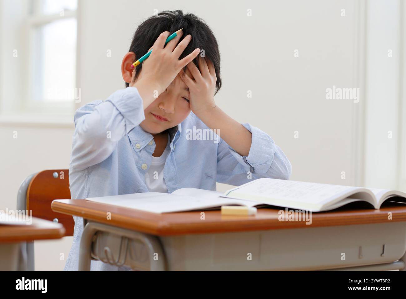 Primary school student who gets sick during class Stock Photo - Alamy