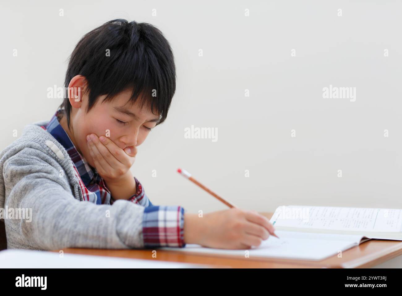 Primary school student who gets sick during class Stock Photo - Alamy