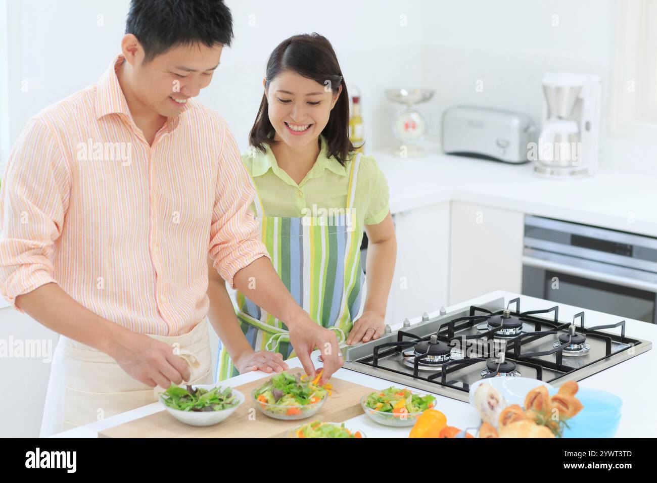 Couple looking at menu at home hi-res stock photography and images - Alamy
