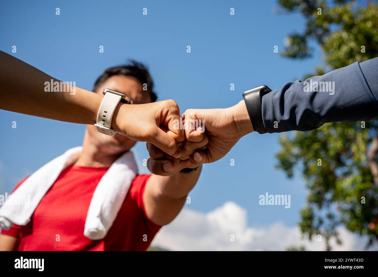 A close-up of a group of sporty individuals in sportswear and ...