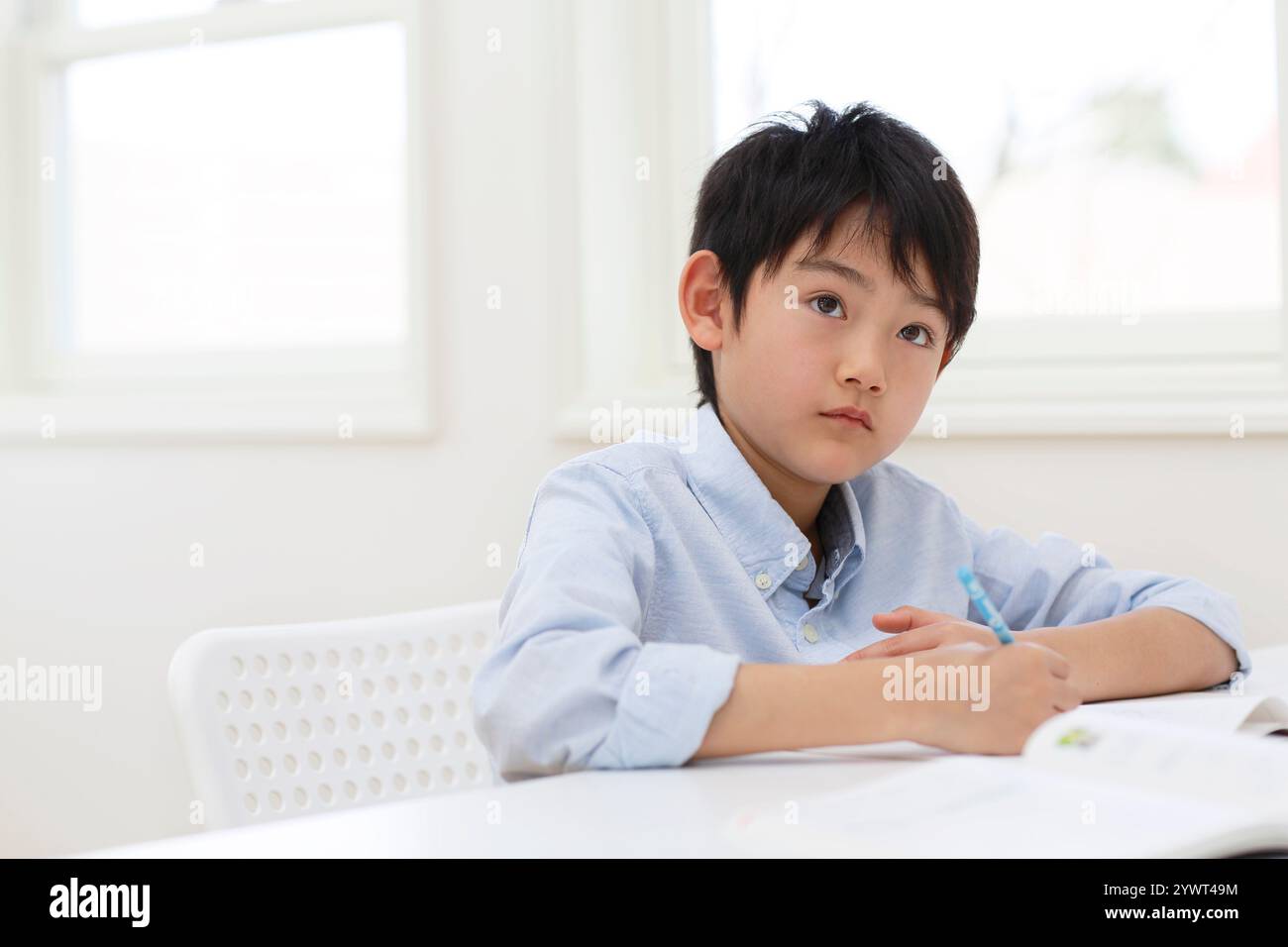 Boys studying in a classroom Stock Photo - Alamy