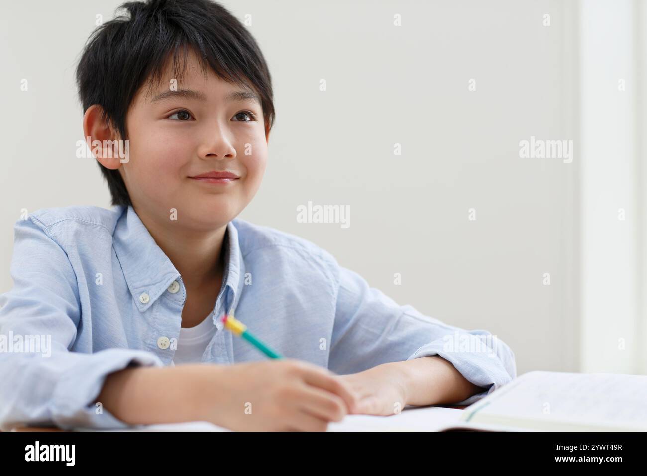 Boys studying in a classroom Stock Photo - Alamy