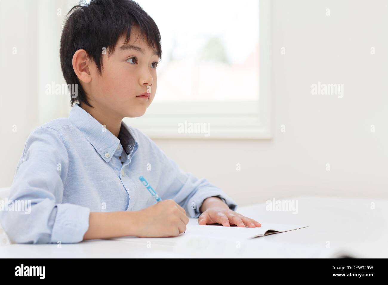 Boys studying in a classroom Stock Photo - Alamy