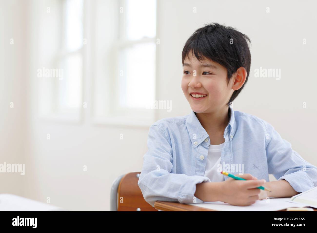 Boys studying in a classroom Stock Photo - Alamy