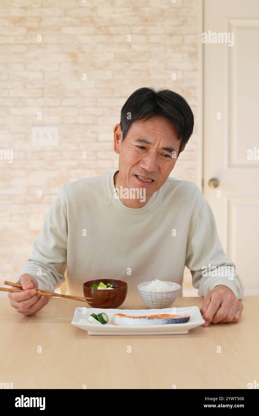 Middle-aged men with loss of appetite Stock Photo - Alamy