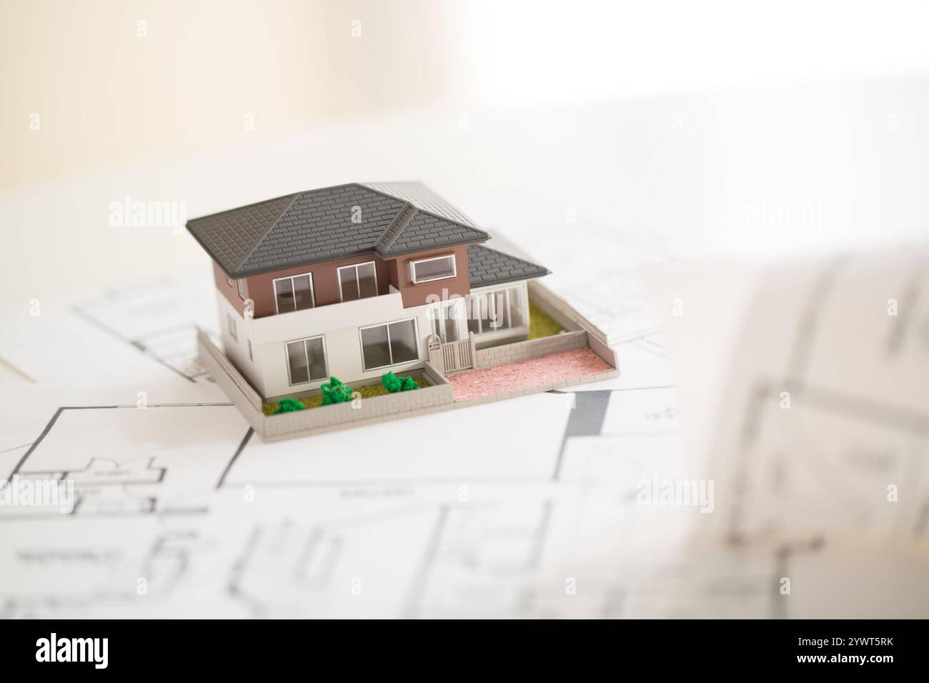 Miniature house and floor plan Stock Photo - Alamy