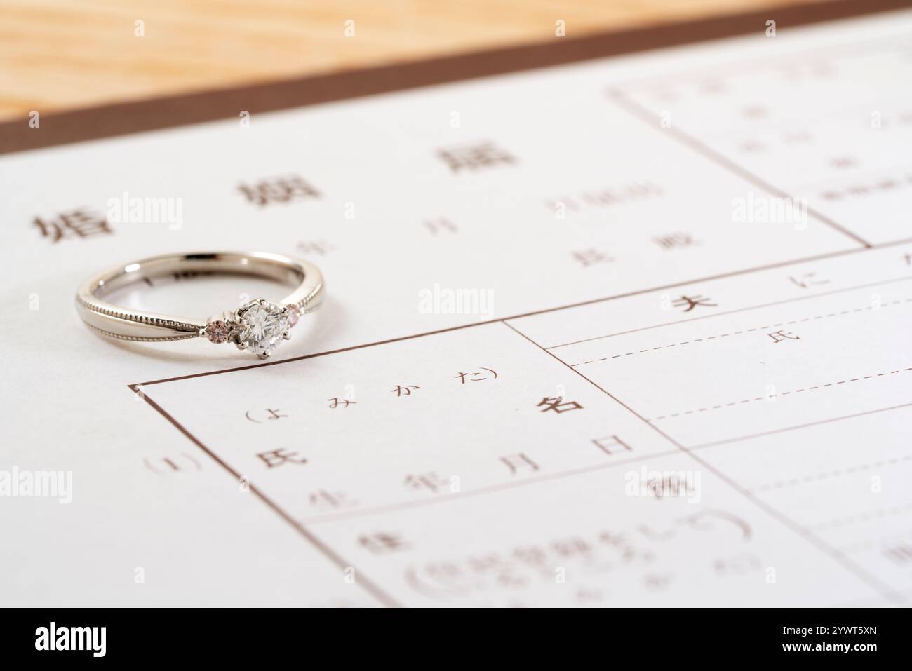 Marriage certificate and engagement ring Stock Photo - Alamy