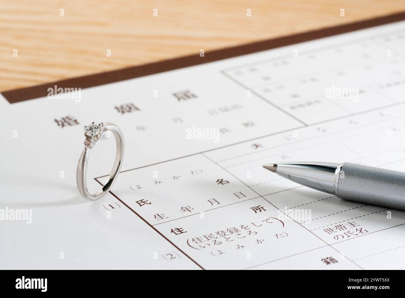 Marriage certificate and engagement ring Stock Photo - Alamy