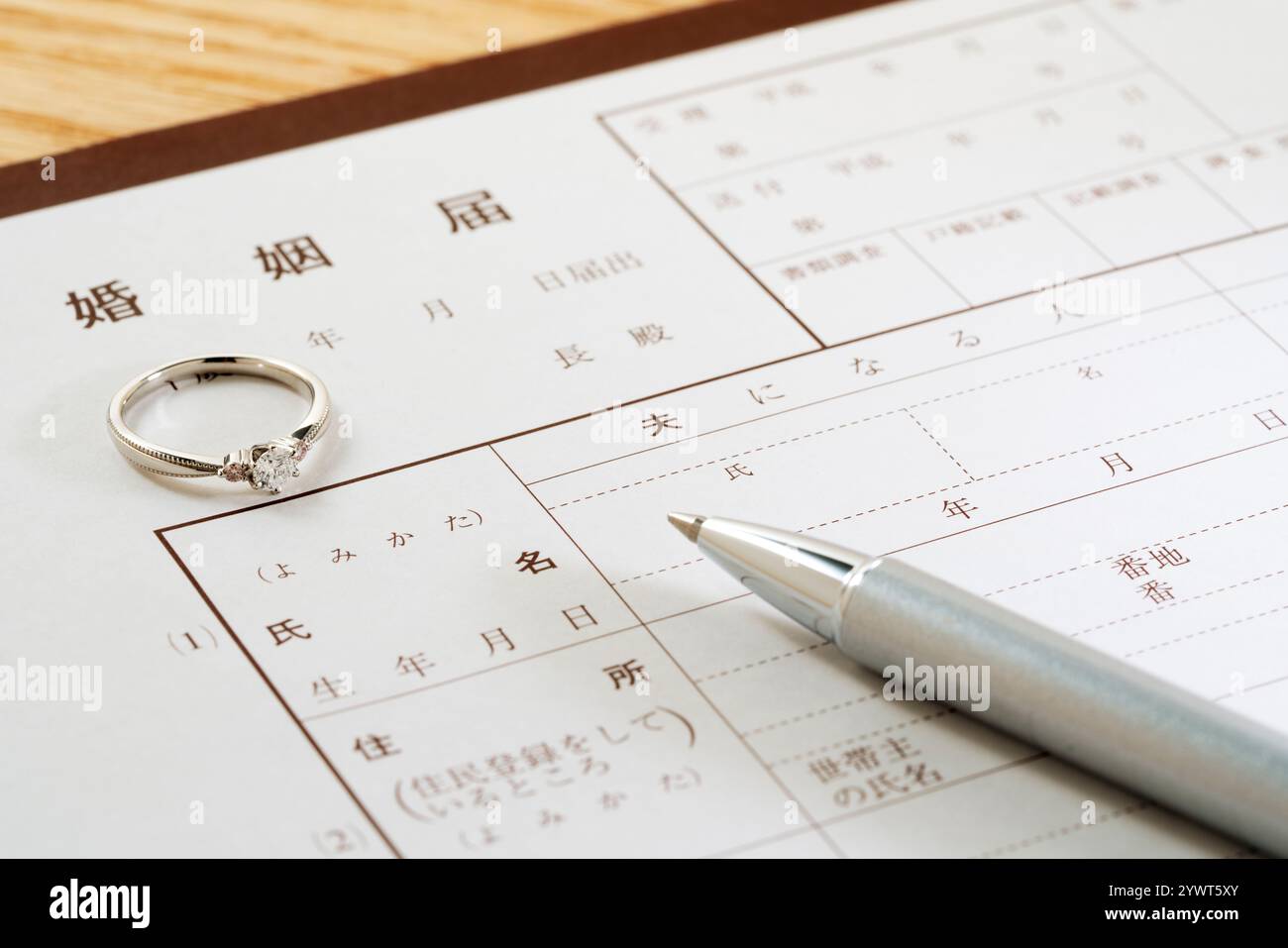 Marriage certificate and engagement ring Stock Photo - Alamy