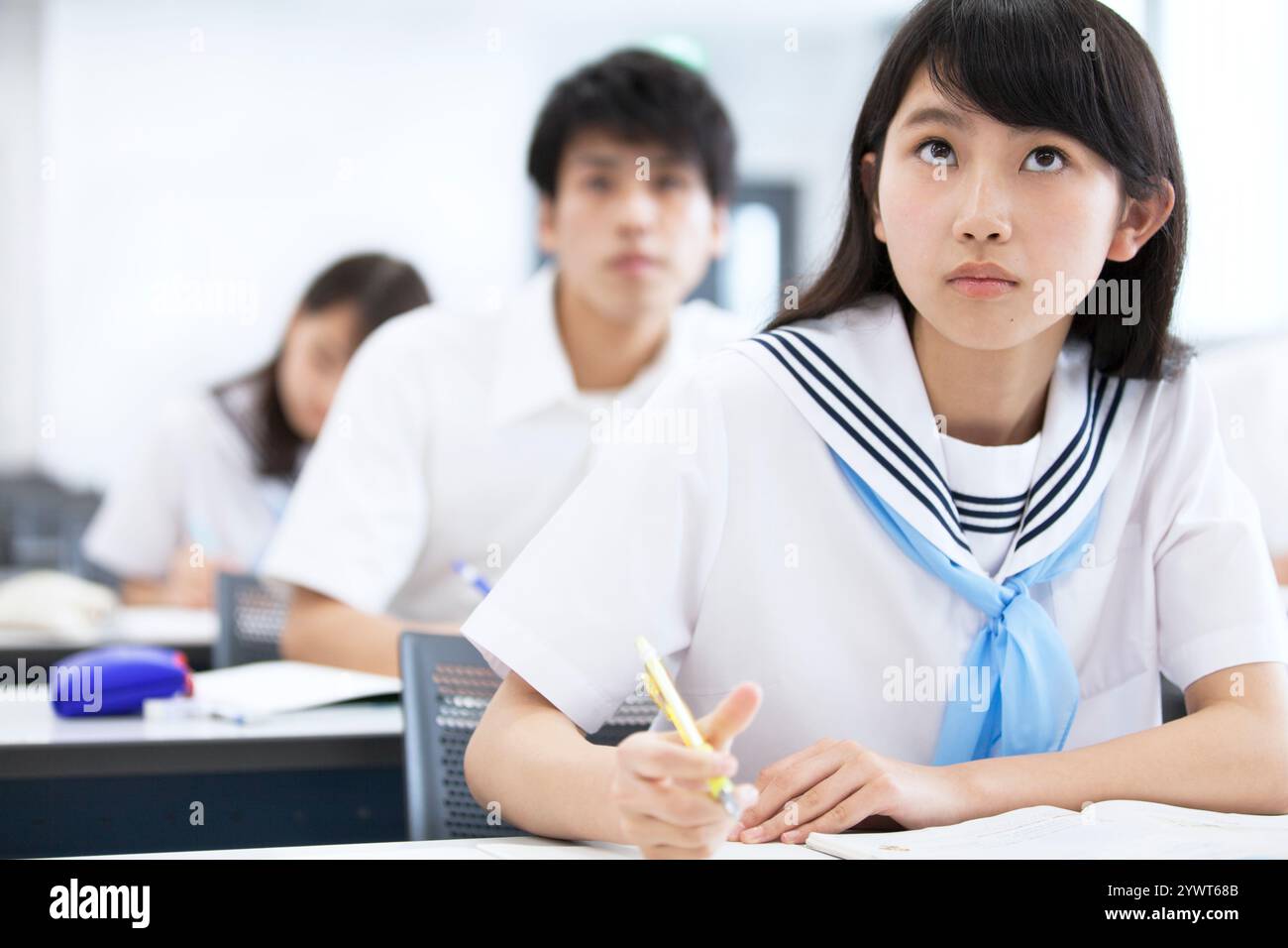 Female students taking a class Stock Photo - Alamy