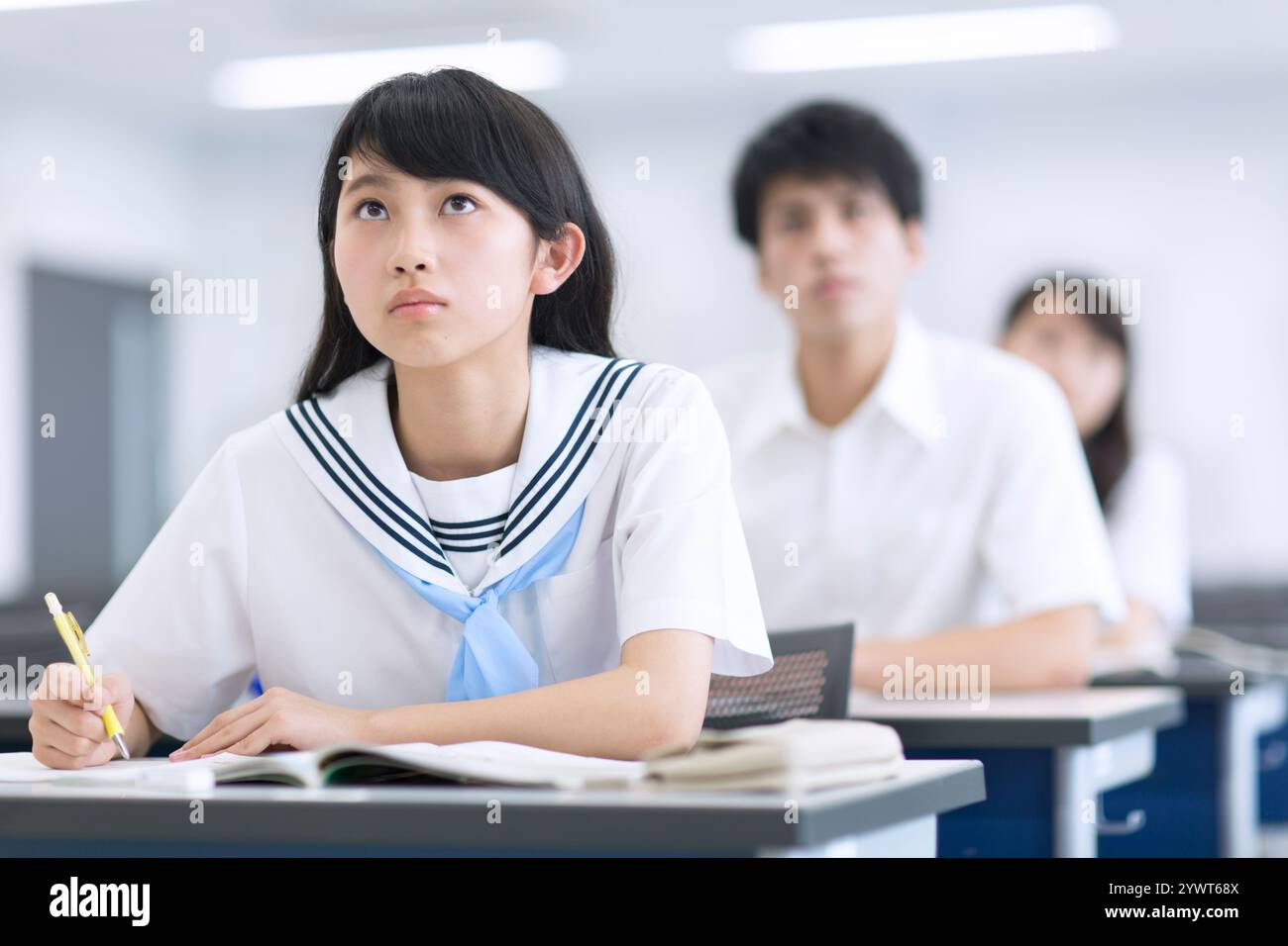 Female students taking a class Stock Photo - Alamy
