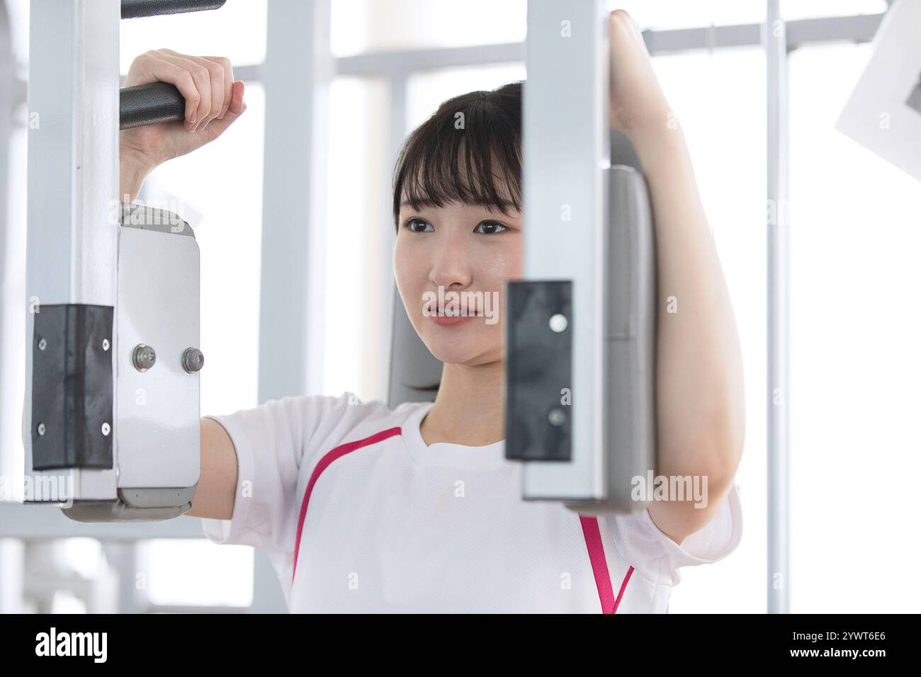 Japanese woman doing muscle training Stock Photo - Alamy