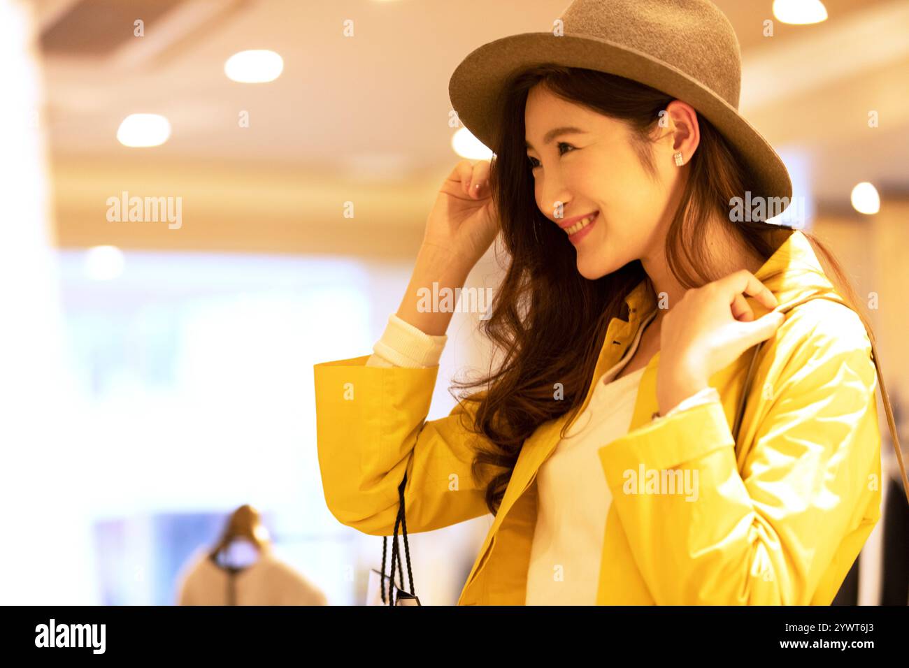 Woman choosing outfit hi-res stock photography and images - Alamy