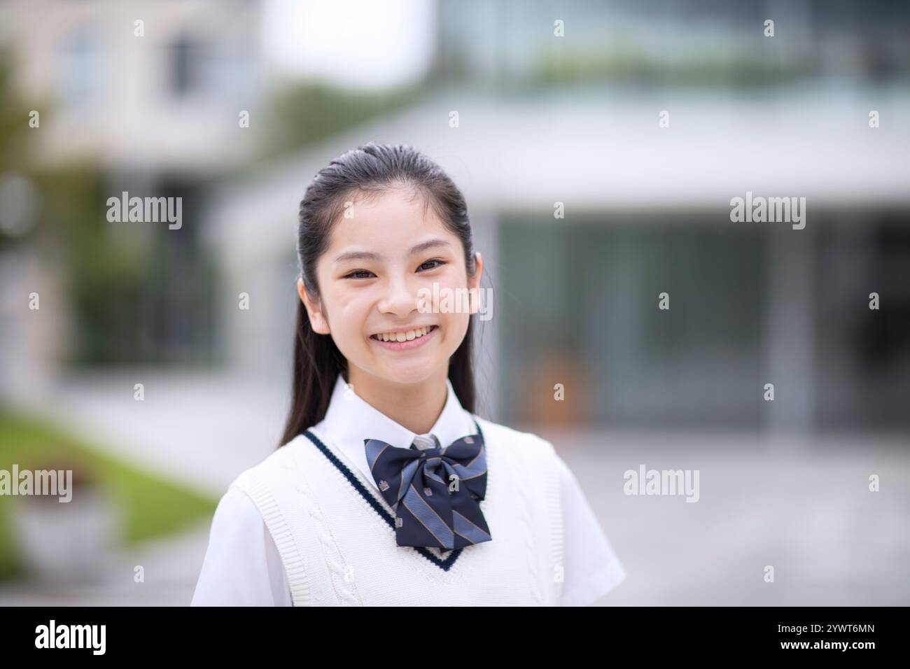 Portrait of smiling high school girl Stock Photo - Alamy