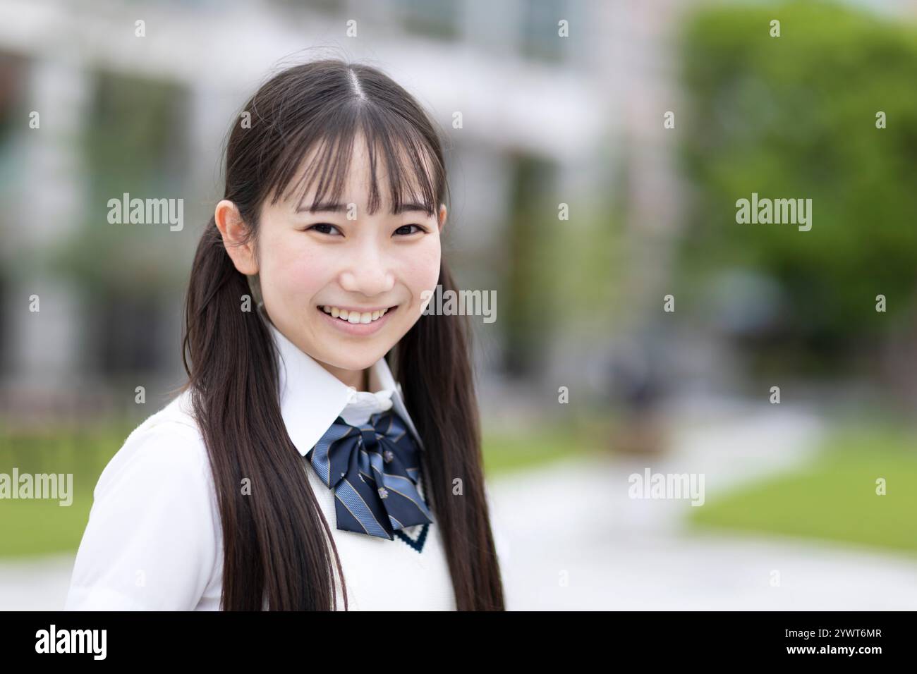 Portrait of smiling high school girl Stock Photo - Alamy
