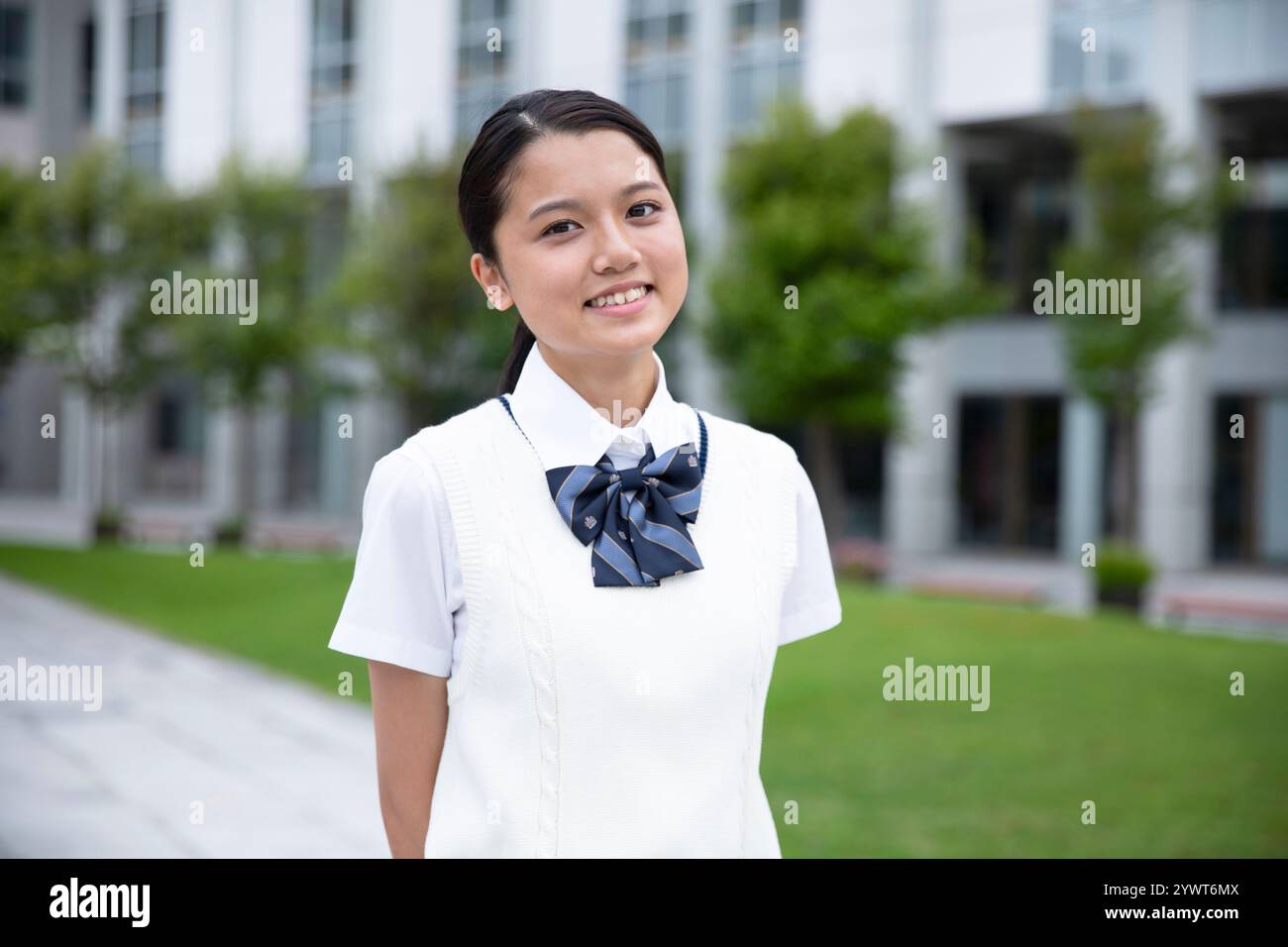 Portrait of smiling high school girl Stock Photo - Alamy