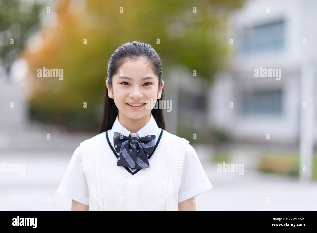 Portrait of smiling high school girl Stock Photo - Alamy