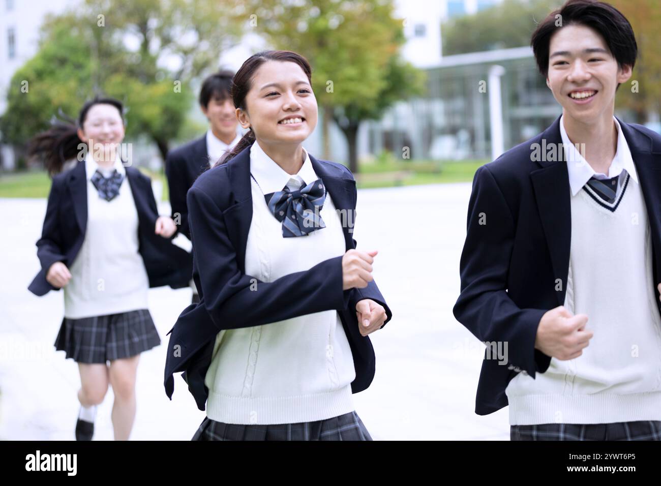High school students running in harmony Stock Photo - Alamy