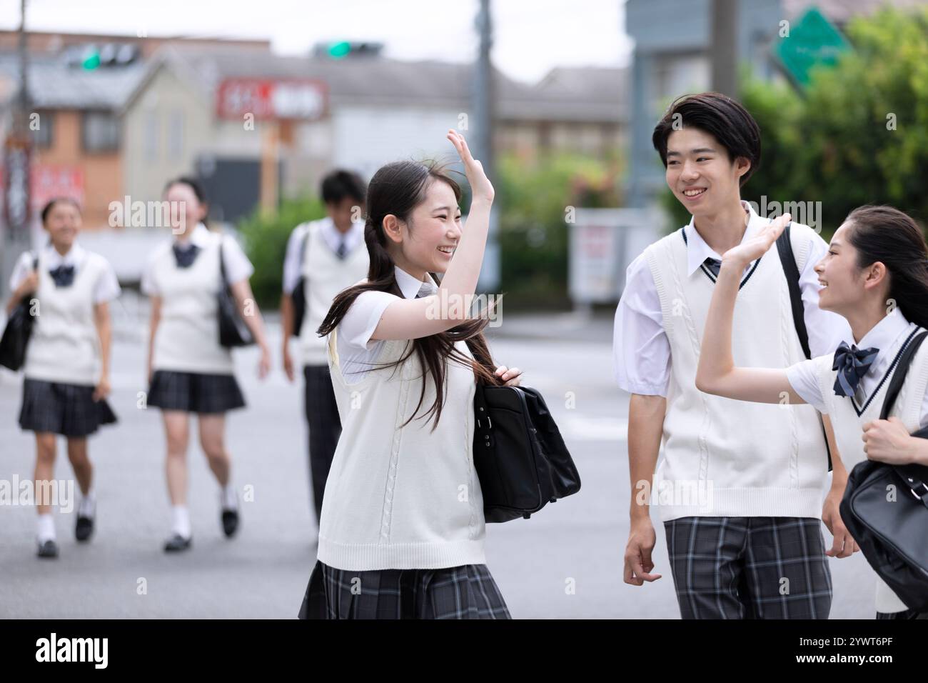 High school students getting along well on their way to school Stock ...