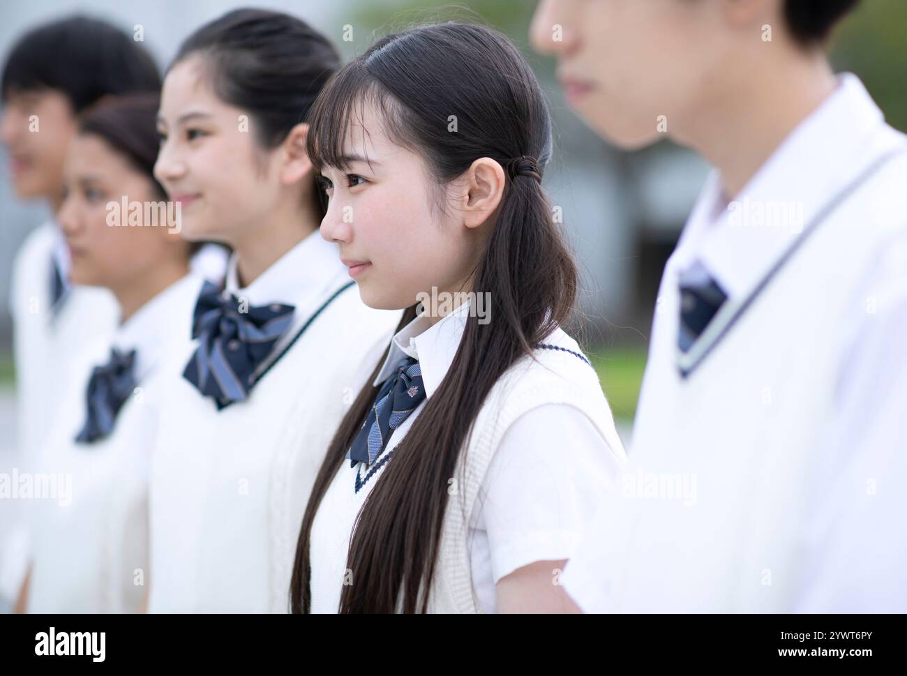 High school students looking forward in a line Stock Photo - Alamy