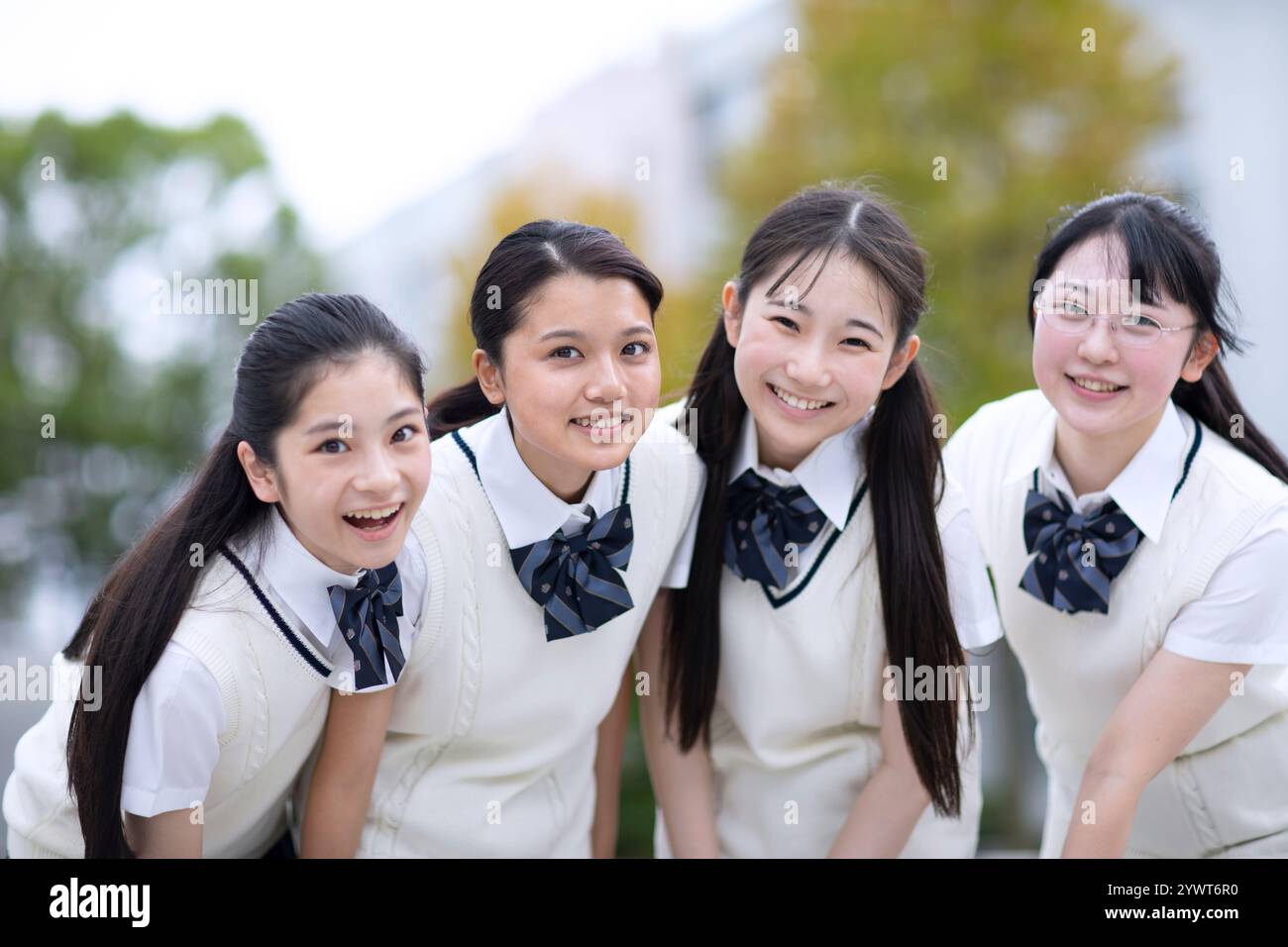 High school girls smiling with friends Stock Photo - Alamy
