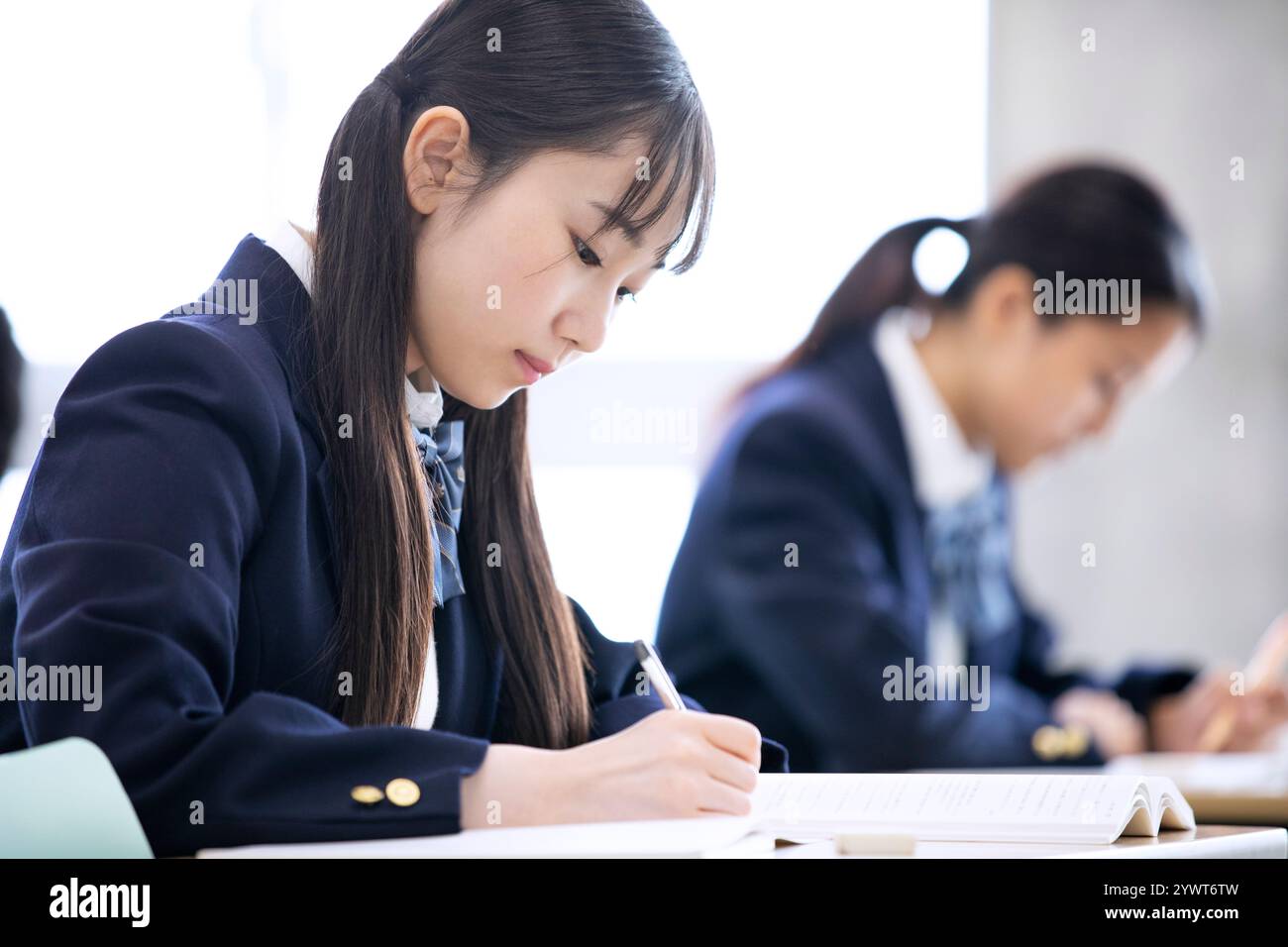 Female high school students during class Stock Photo - Alamy