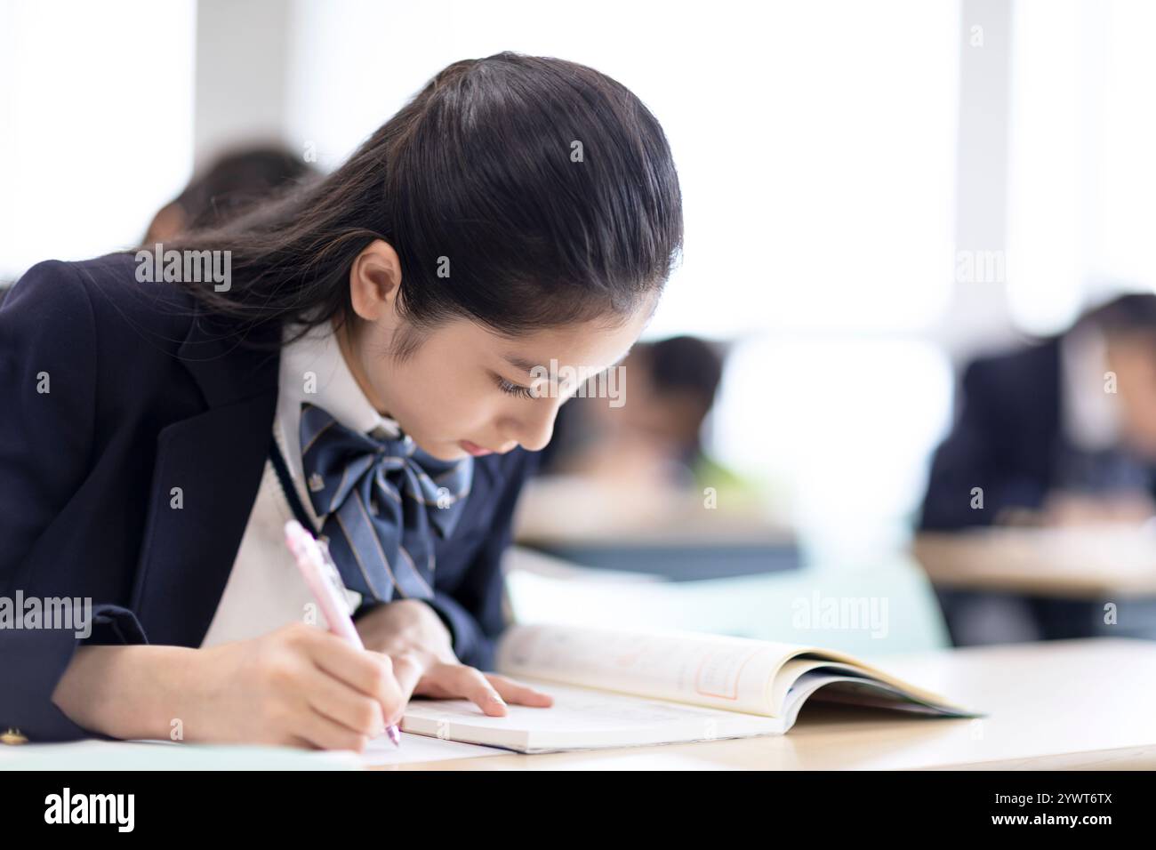 Female high school students during class Stock Photo - Alamy