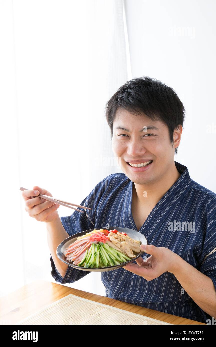 Japanese man and chilled noodles Stock Photo - Alamy