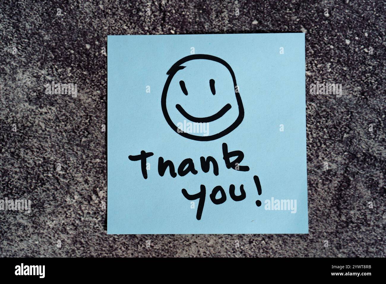Thank you words written on a post-it or note Stock Photo - Alamy