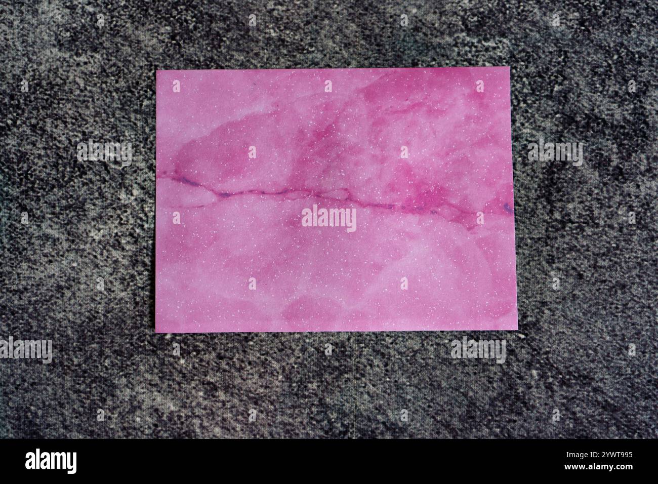 A Fancy sticky note or post-it note on a synthetic granite countertop ...