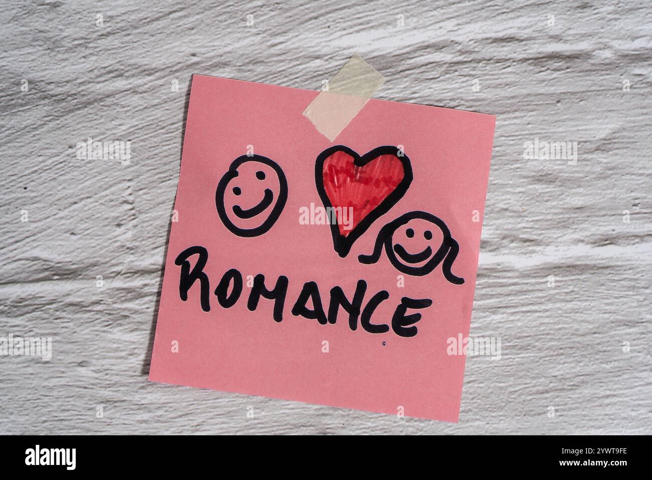 Sticky note or post-it with a word, a heart and some romantic emojis ...