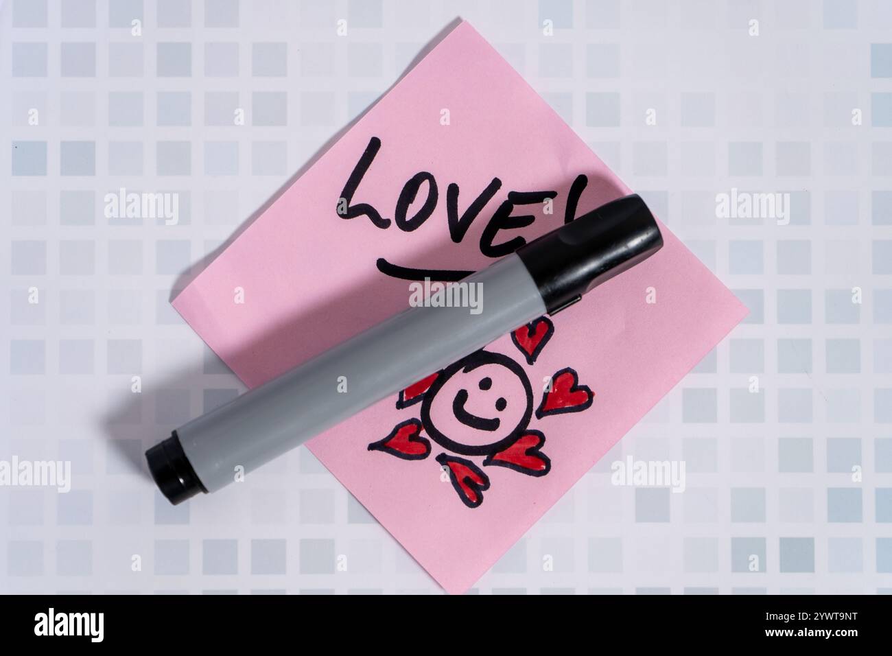 Sticky note with LOVE word handwritten message Stock Photo - Alamy