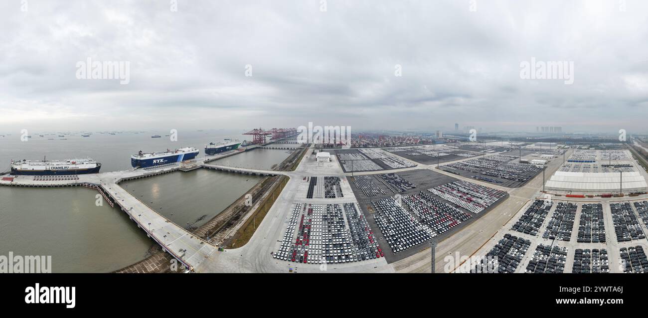 Cars are loaded and unloaded at a ro-ro vehicle terminal for export at ...