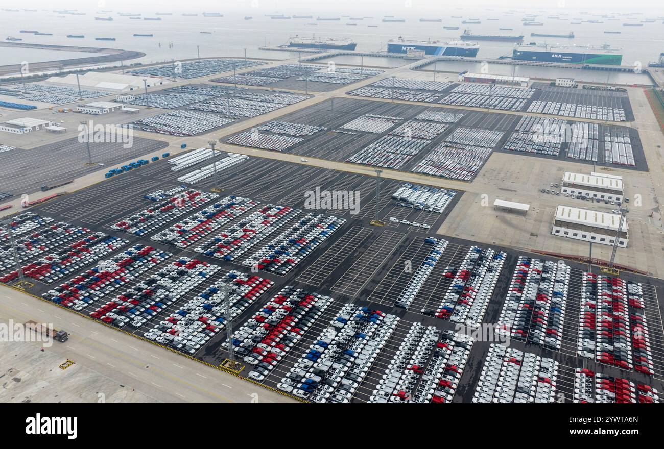 Cars are loaded and unloaded at a ro-ro vehicle terminal for export at ...