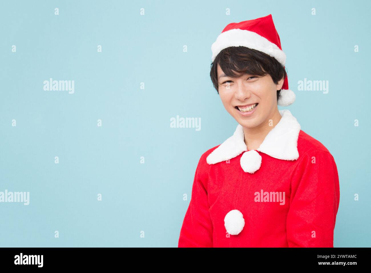 Young man dressed santa hi-res stock photography and images - Alamy