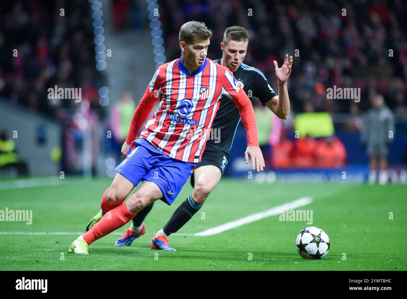 Madrid, Spain. 11th Dec, 2024. Alexander Sorloth (L) of Atletico de ...