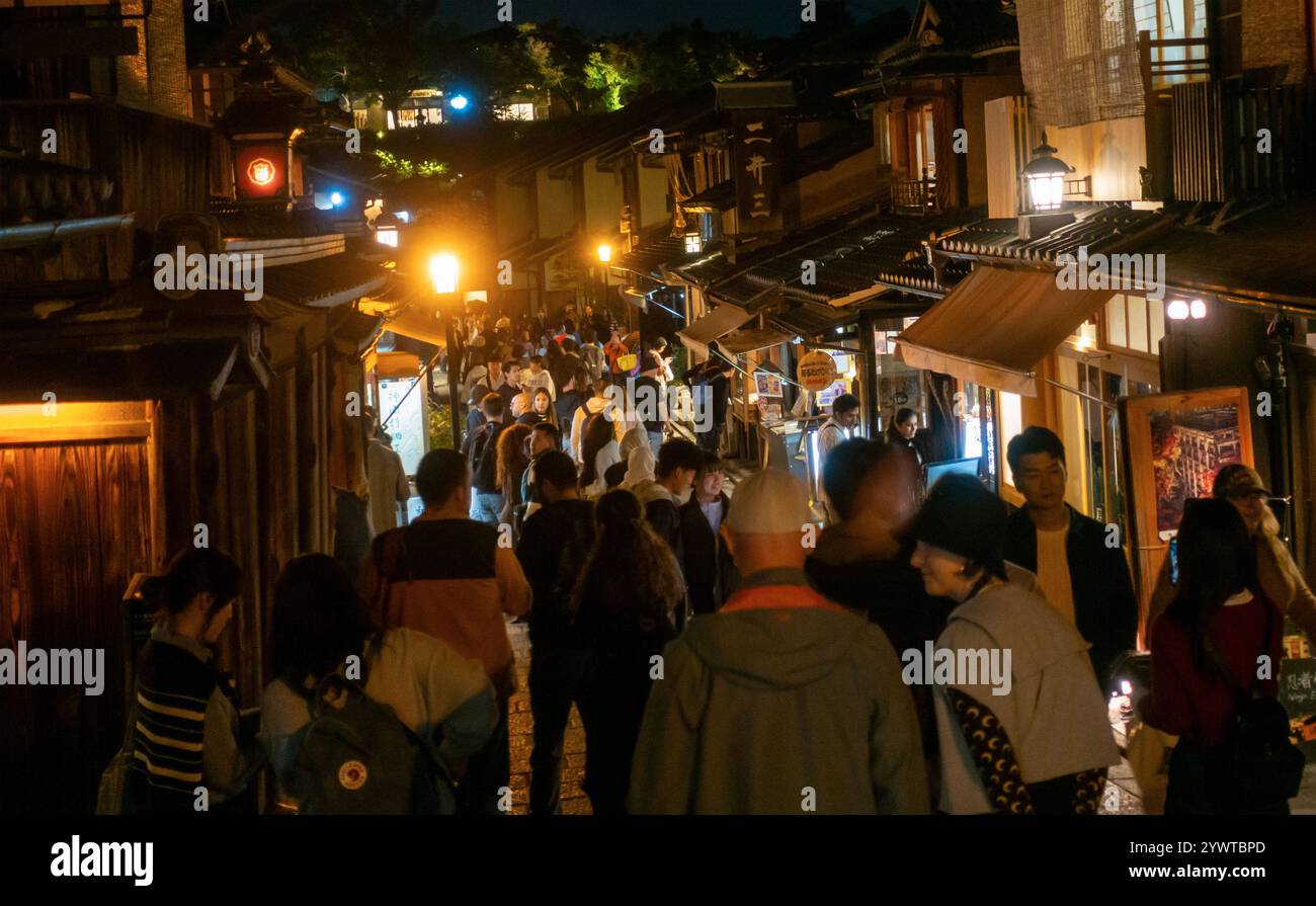 crowded local streets in the Higashiyama neighborhood in Kyoto Japan ...