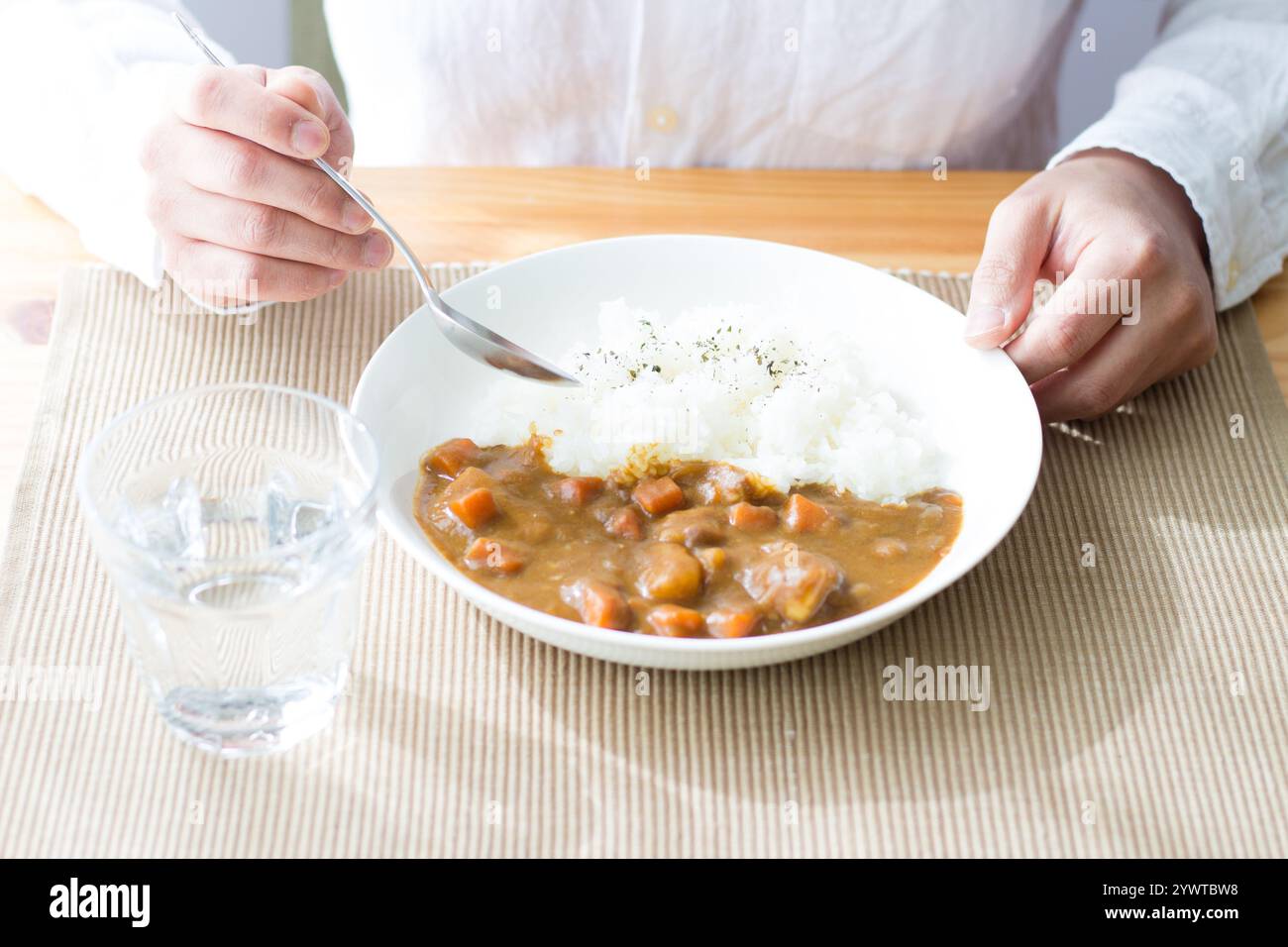 Man eating curry Stock Photo - Alamy