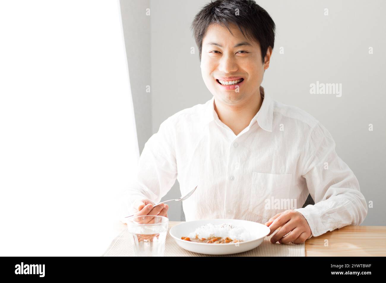 Man eating curry hi-res stock photography and images - Alamy