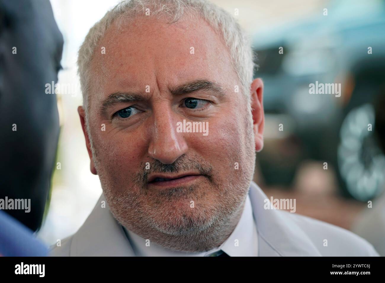 FILE - Jeremie Papin, chairperson of Nissan Americas, speaks with an ...