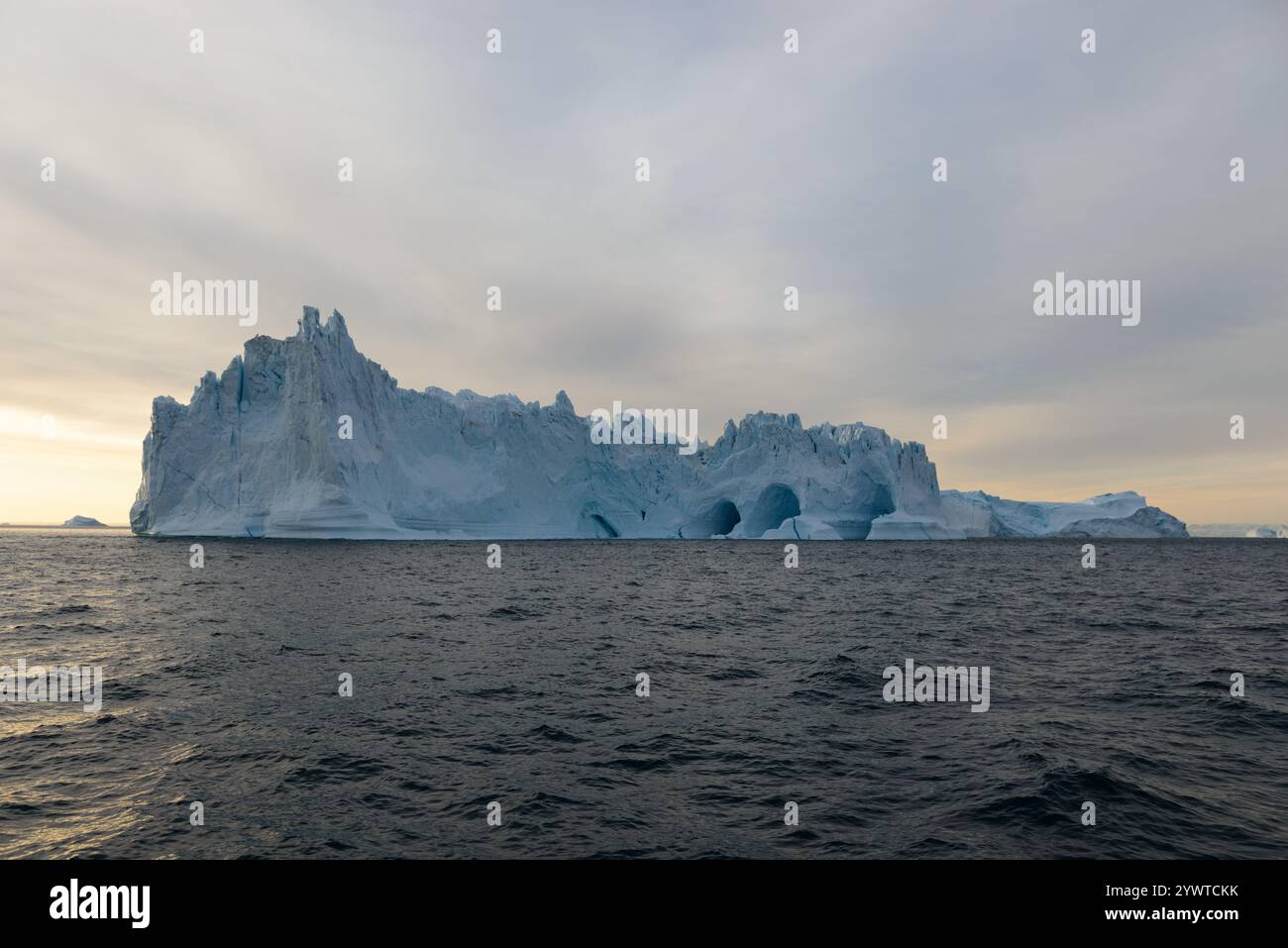 Iceberg floating on Water Stock Photo - Alamy