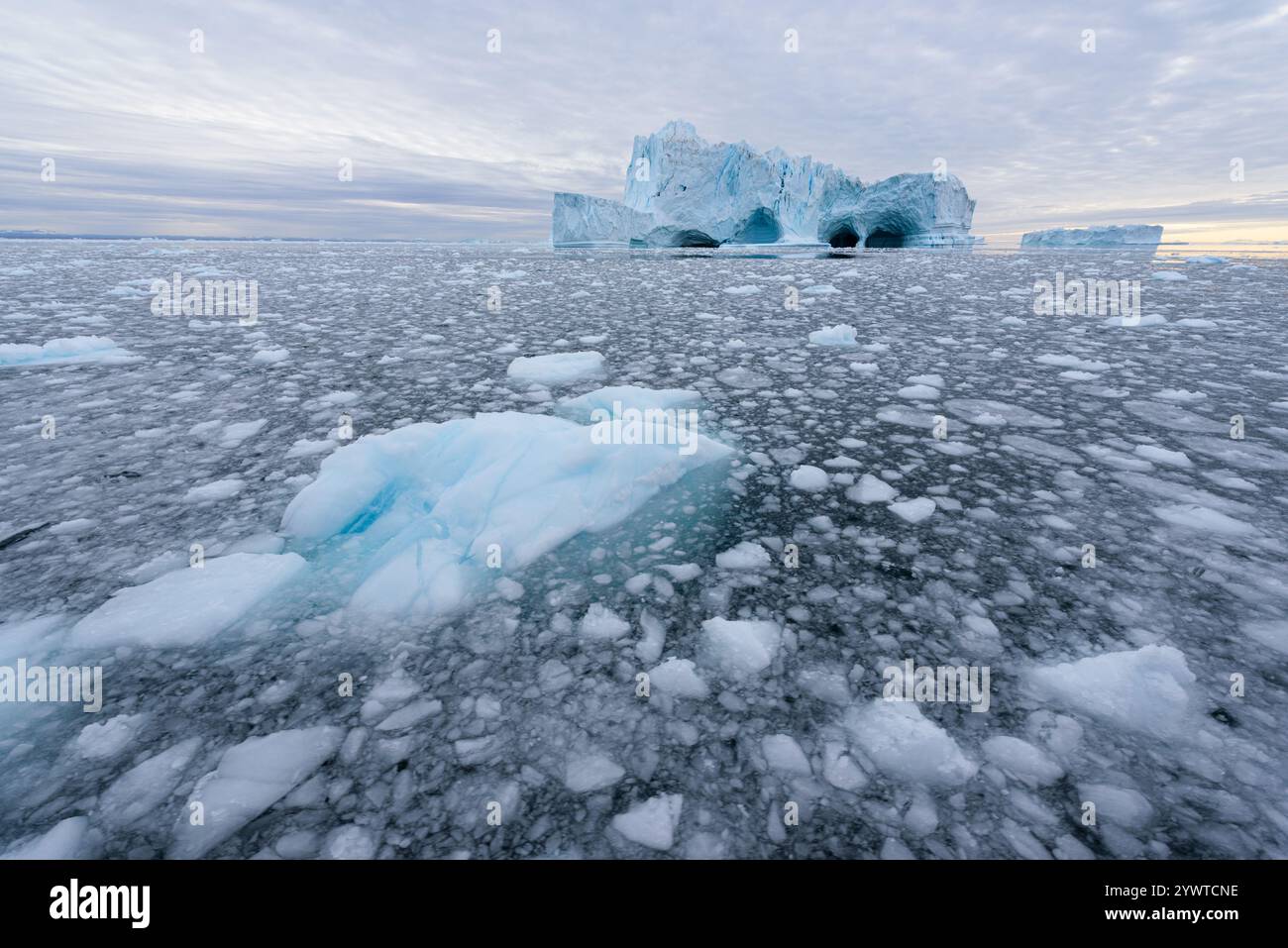 Iceberg floating on Water Stock Photo - Alamy