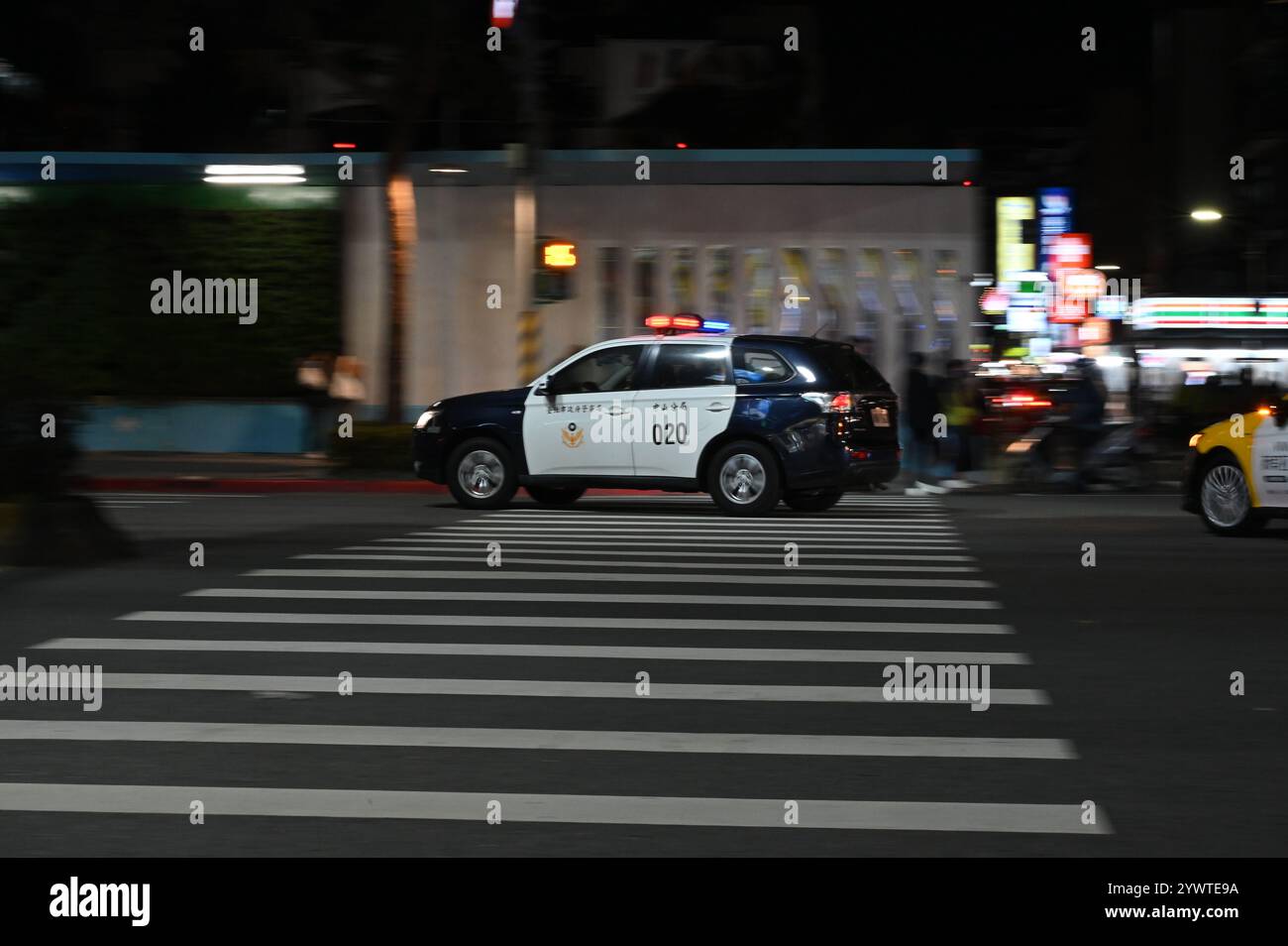 Taipeh, Taiwan. 10th Dec, 2024. A Taiwanese police car turns at an ...