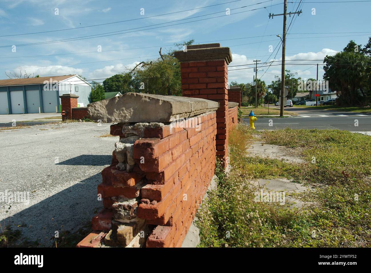 Leading line down edge broken Old red brick masonry wall with bright ...