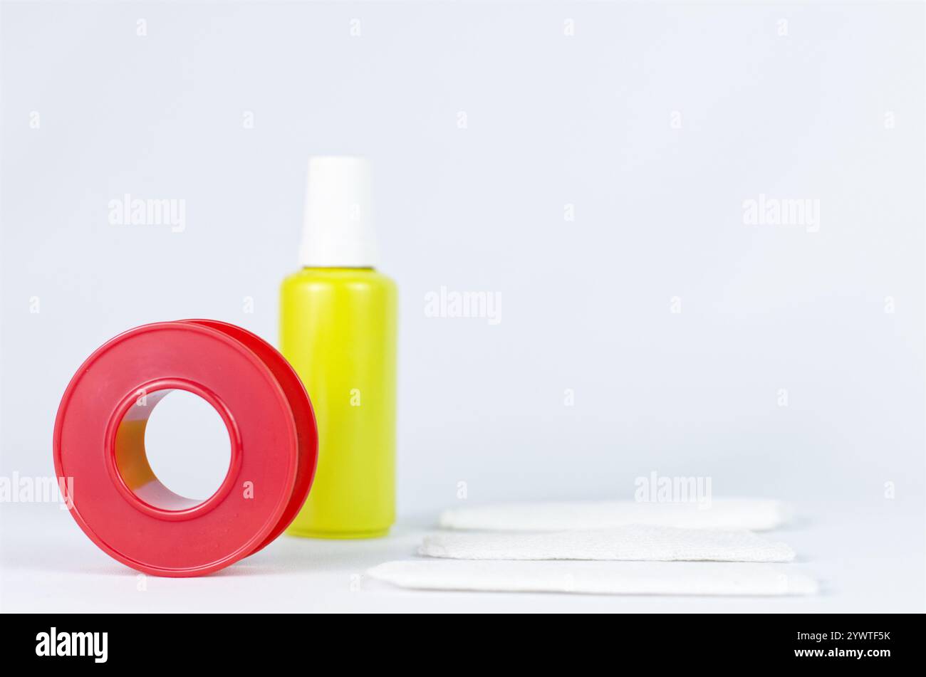 Set of Medical Supplies Including Red Reel and Yellow Bottle Stock ...