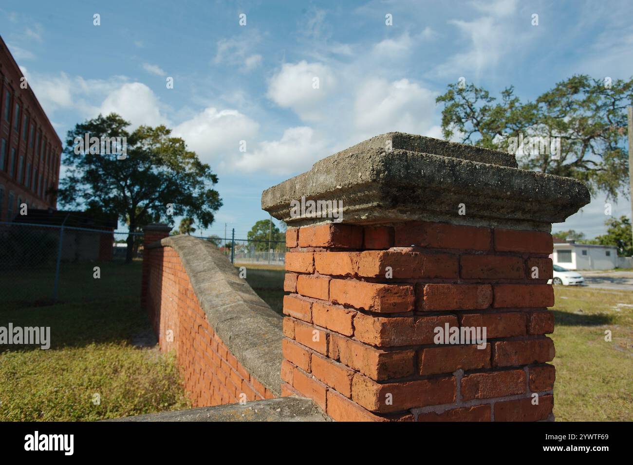 Leading line down edge broken Old red brick masonry wall with bright ...