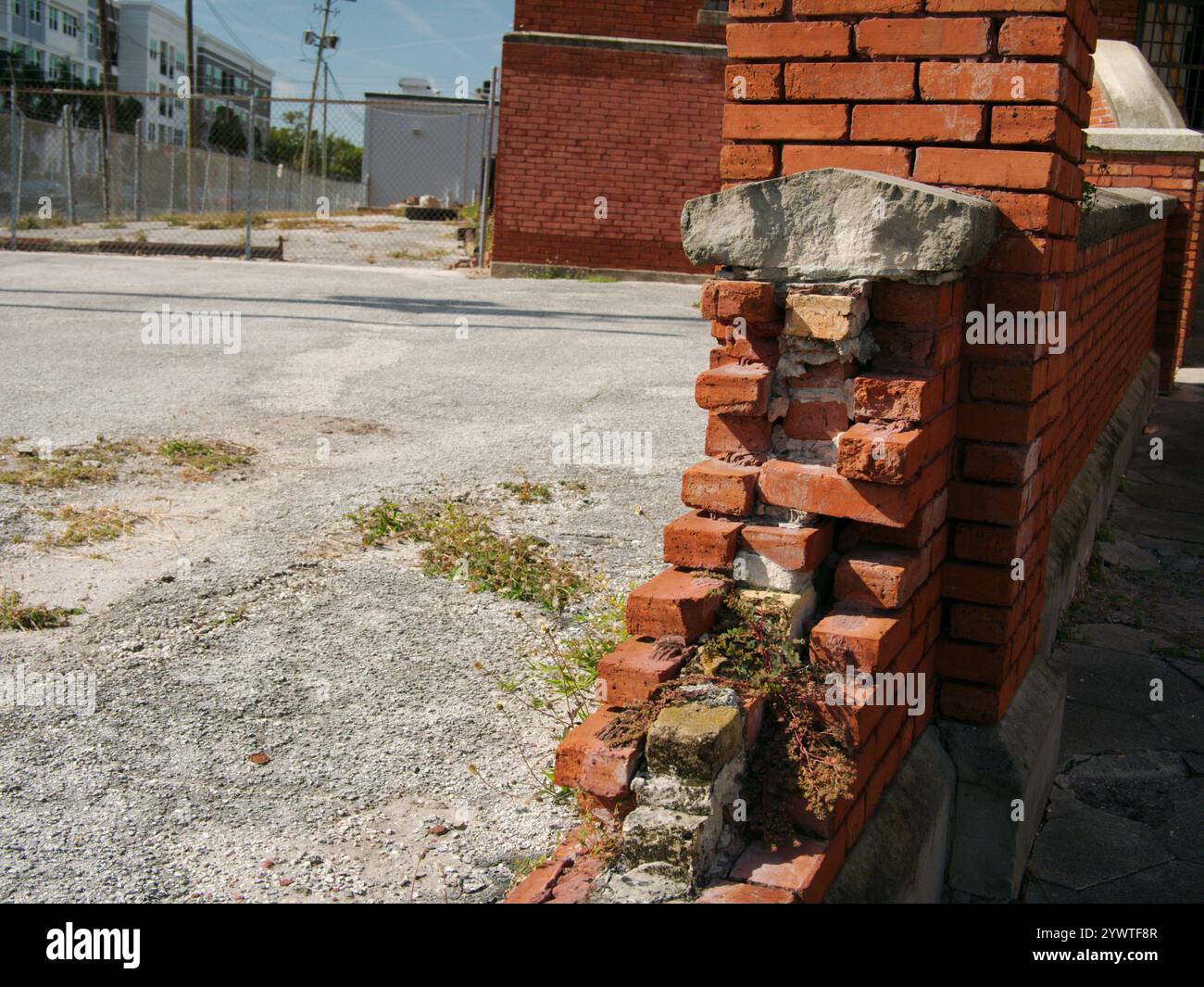 Leading line down edge broken Old red brick masonry wall with bright ...